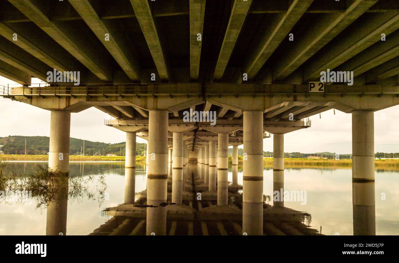Perspective view of underside of bridge with the bridge reflection in ...