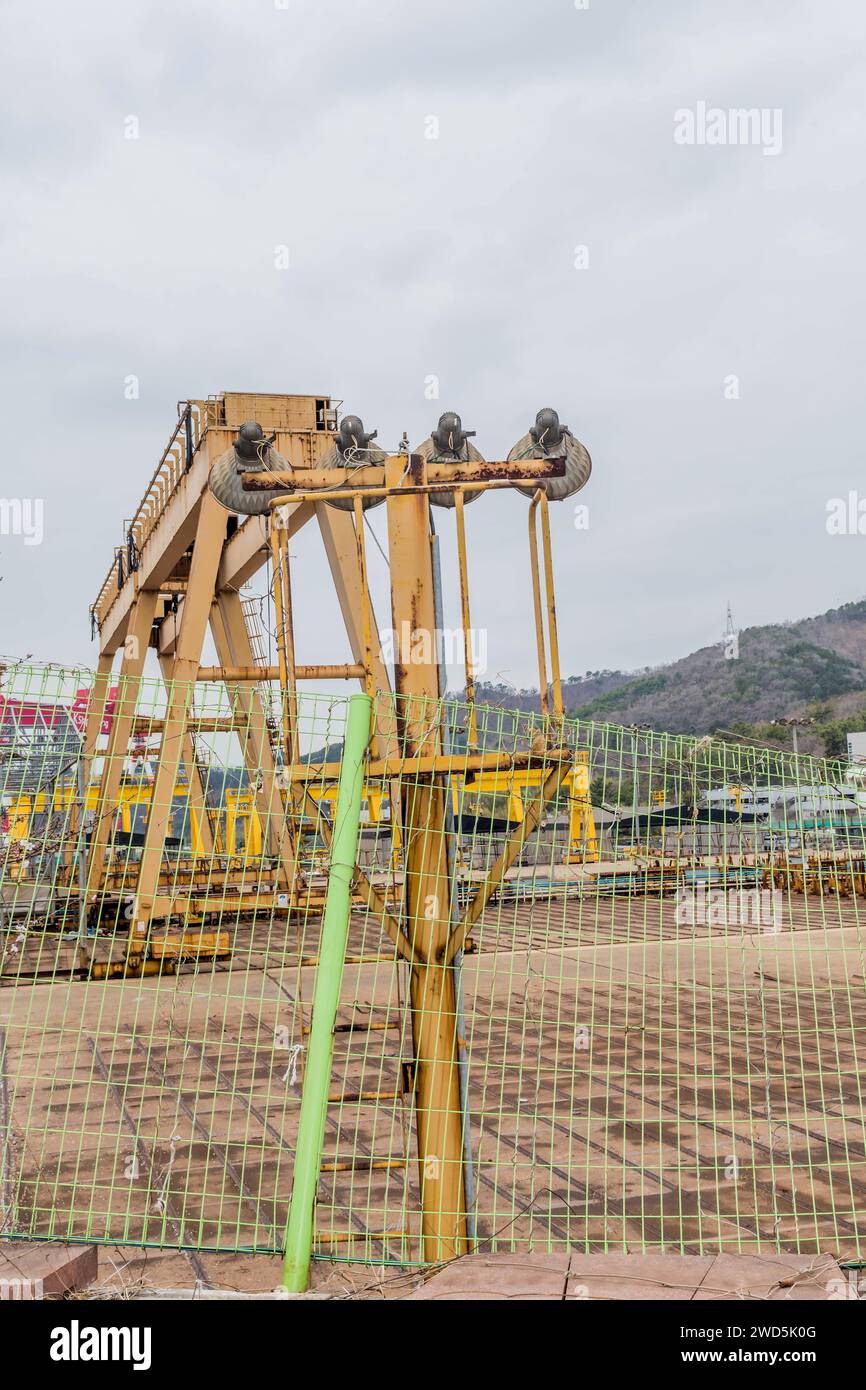 Industrial floodlights and ship building rigs at ship building yard on ...