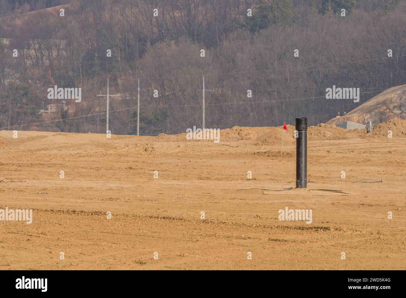 Corrugated pipe for plumping extruding from under ground at ...