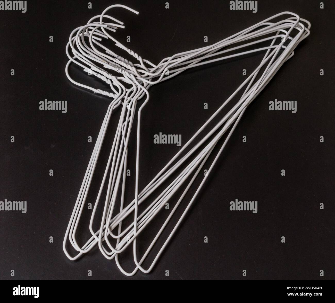 Wire coat hanger hi-res stock photography and images - Alamy