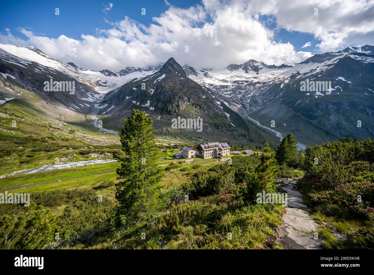 Mountain landscape with hiking trail, mountain hut Berliner Huette ...