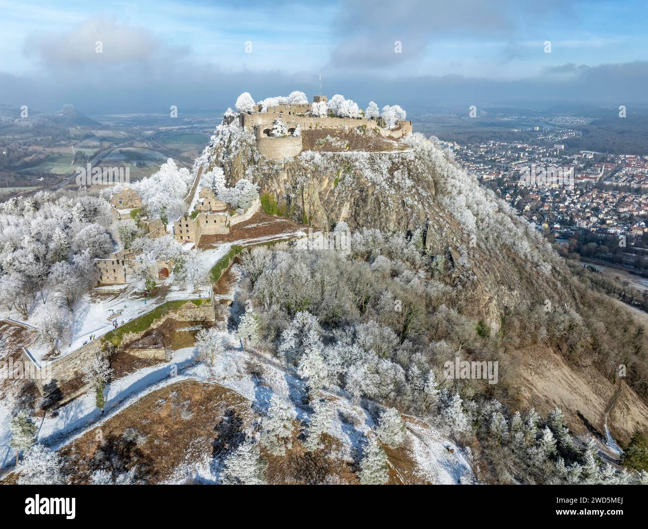 Aerial view of the snow-covered Hegau volcano Hohentwiel with Germany's ...