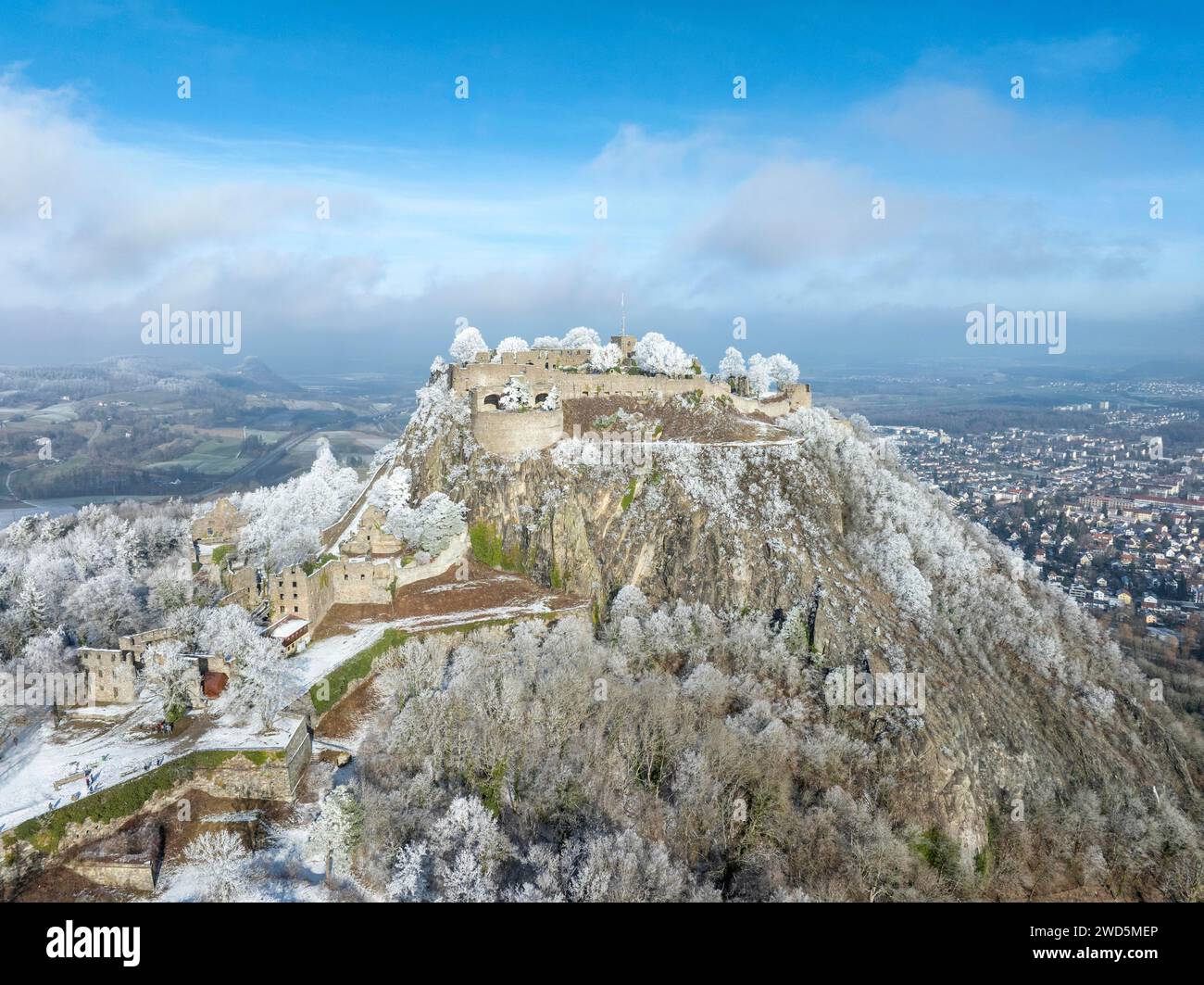 Aerial view of the snow-covered Hegau volcano Hohentwiel with Germany's ...