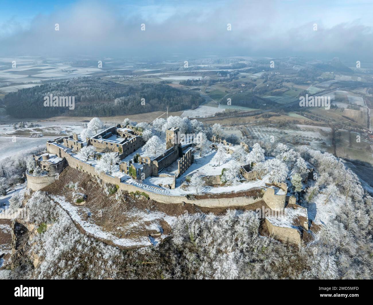 Aerial view of the snow-covered Hegau volcano Hohentwiel with Germany's ...
