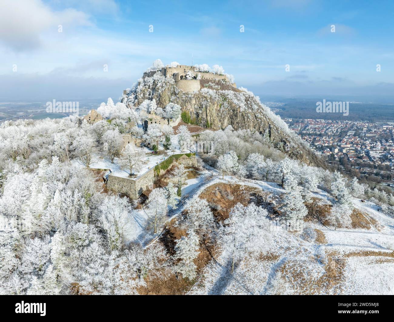 Aerial view of the snow-covered Hegau volcano Hohentwiel with Germany's ...