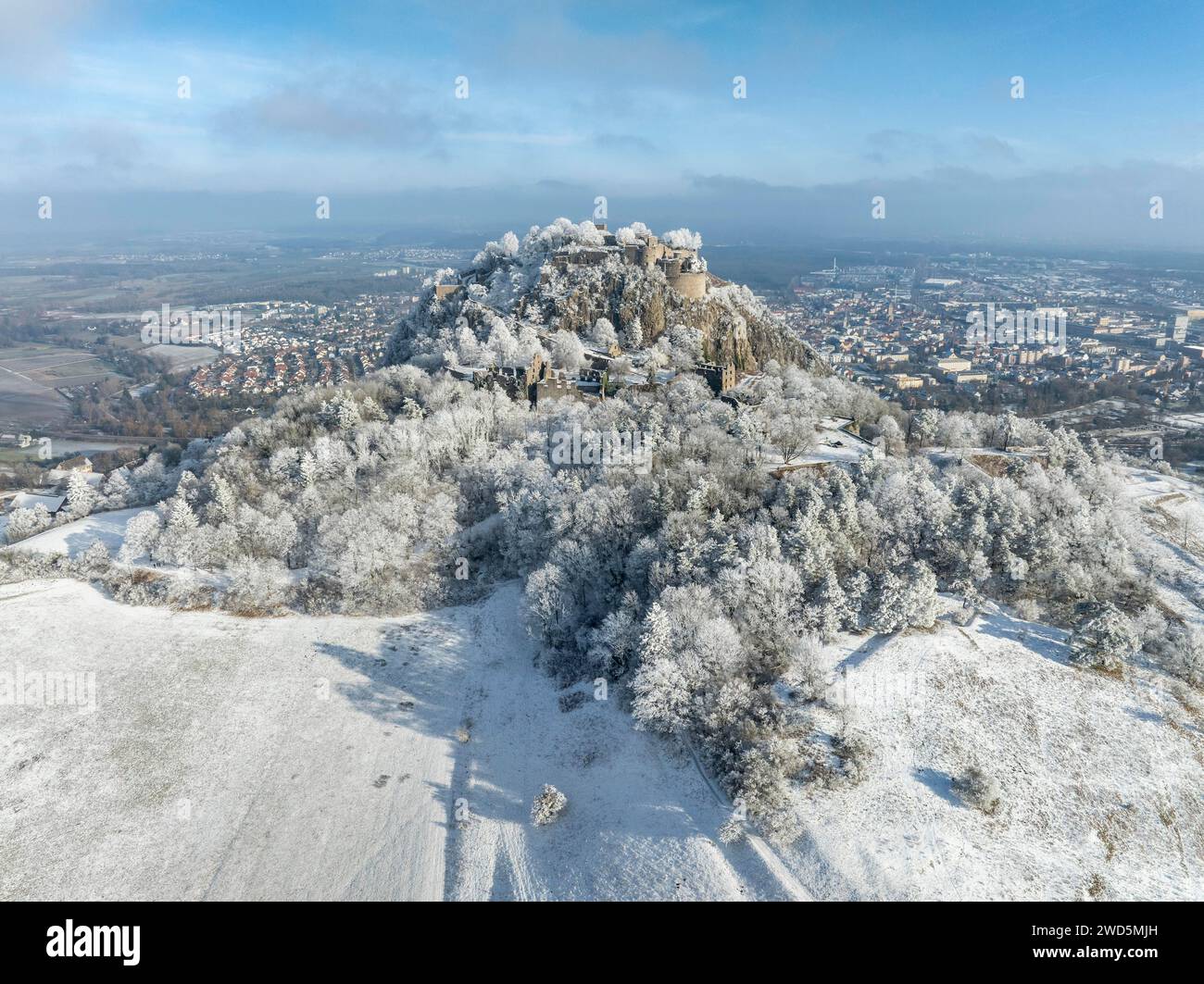 Aerial view of the snow-covered Hegau volcano Hohentwiel with Germany's ...