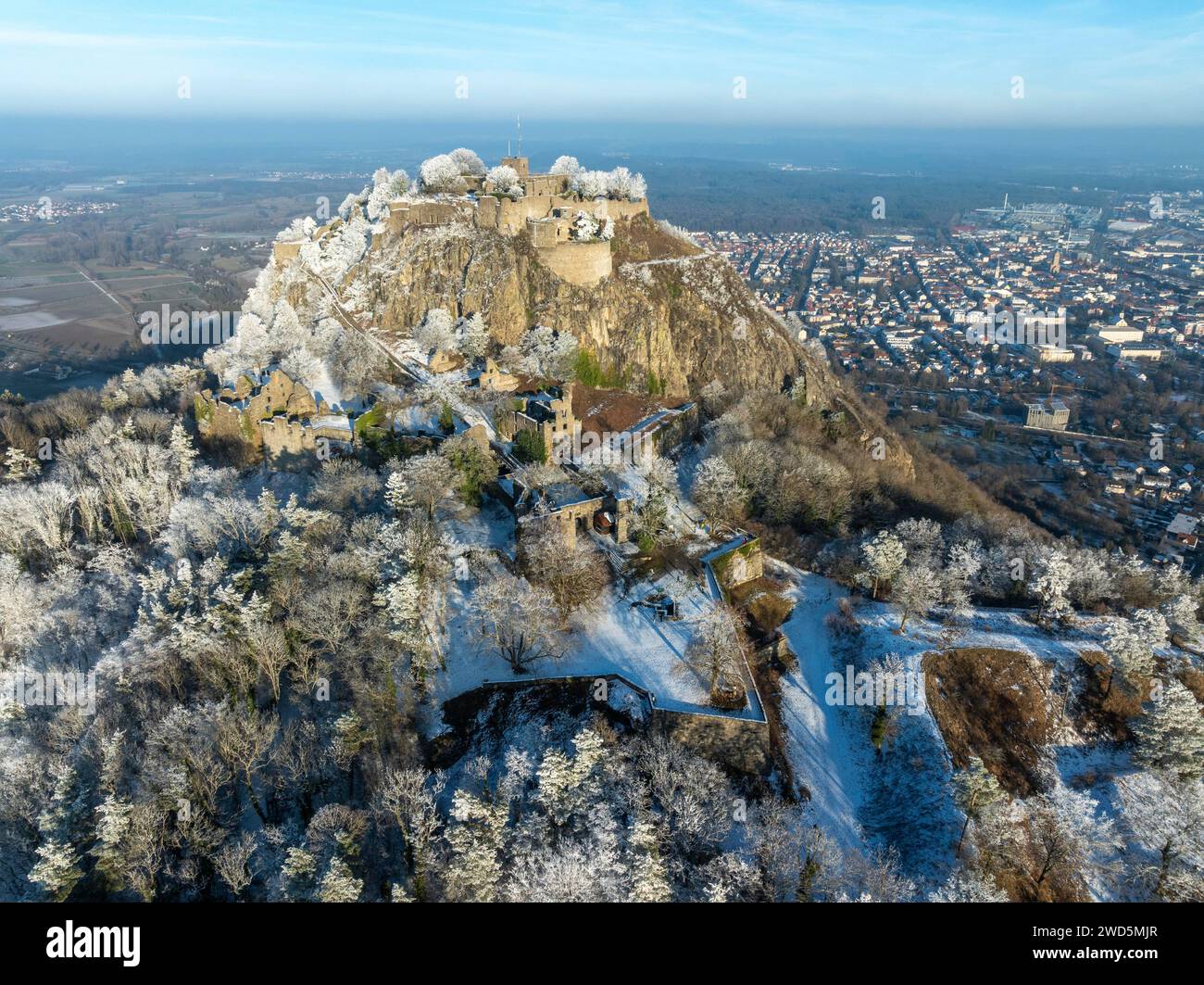 Aerial view of the snow-covered Hegau volcano Hohentwiel with Germany's ...