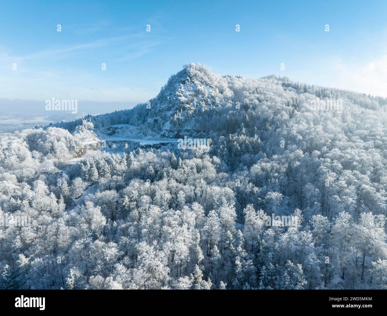 Aerial view of the snow-covered Hegau volcano Hohenstoffeln, with the ...