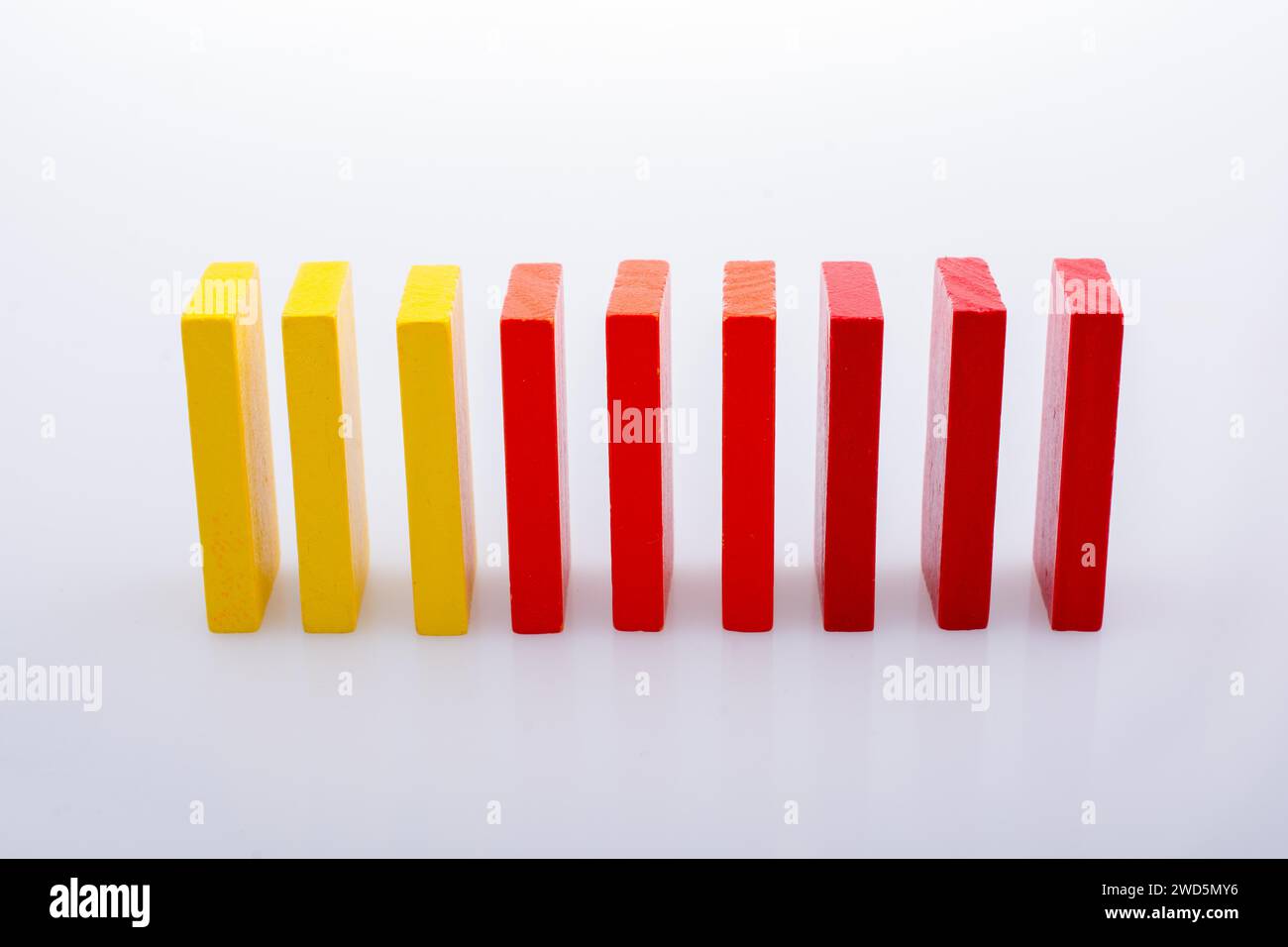 Colorful Domino Blocks placed on a white background Stock Photo - Alamy
