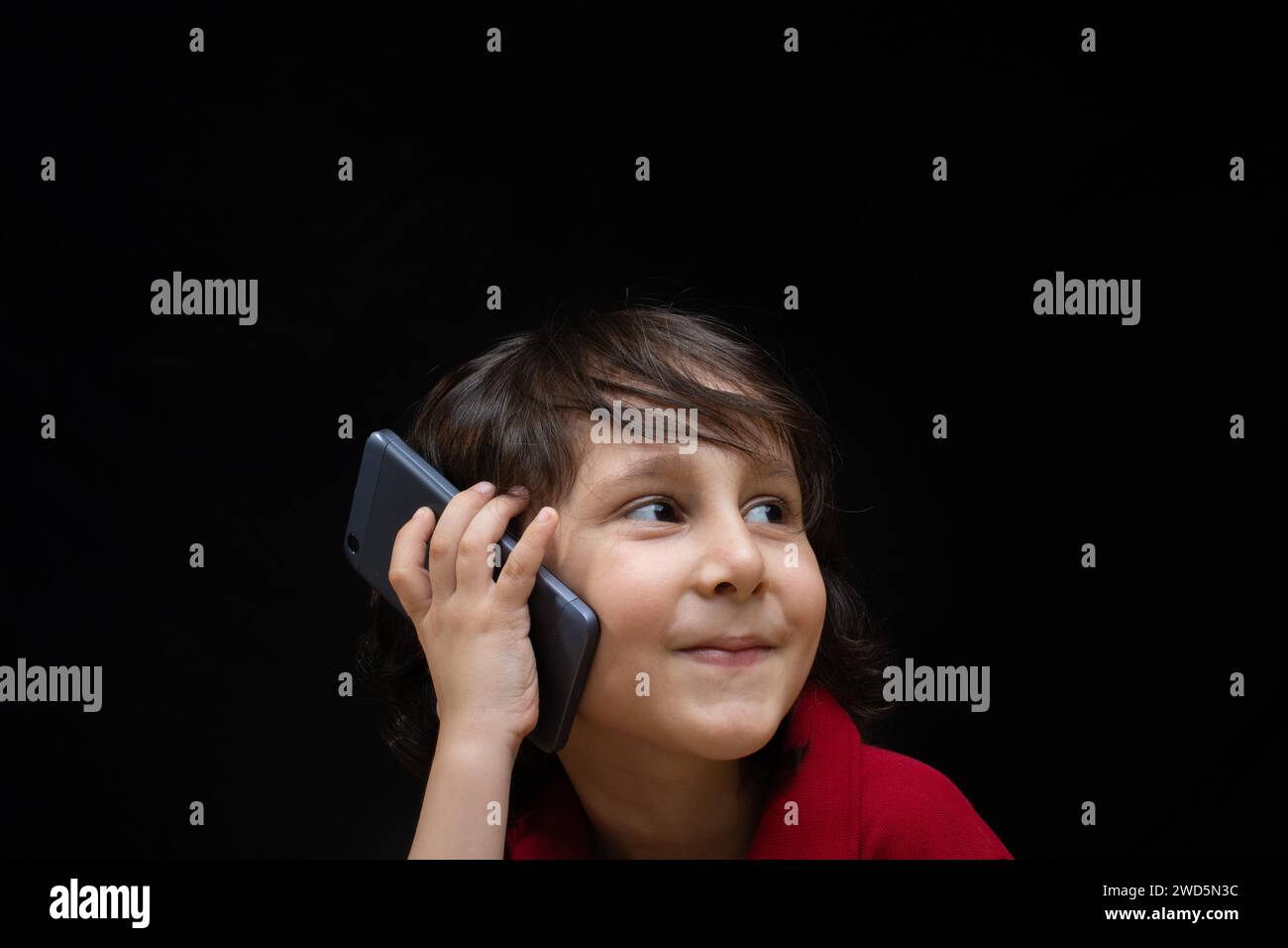Little boy hold smartphone as modern mobile communication gadget Stock ...