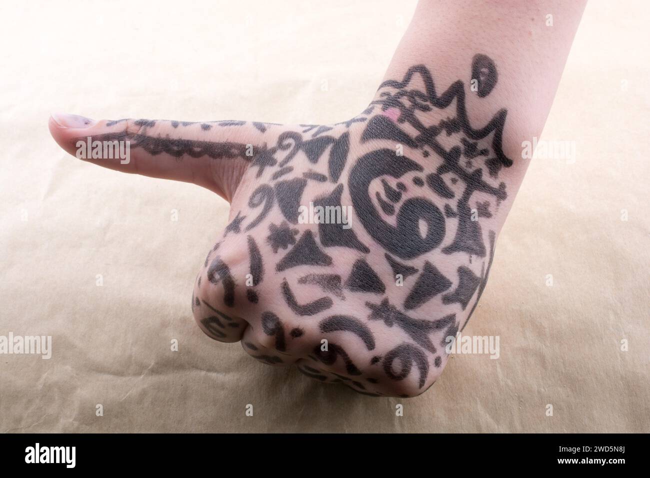 Hand with tattoo on a background Stock Photo - Alamy