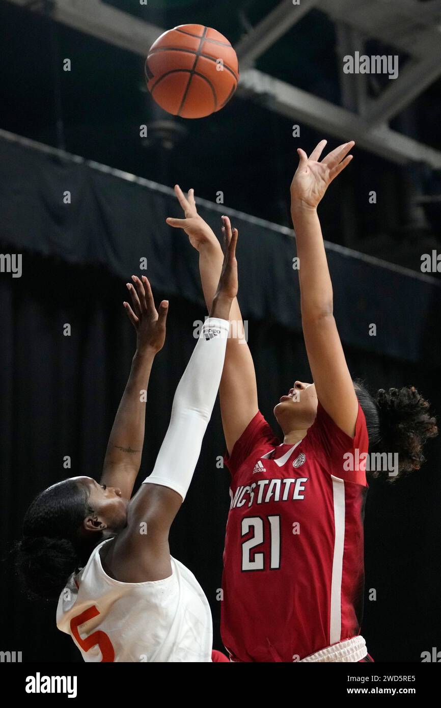 North Carolina State guard Madison Hayes (21) shoots as Miami guard ...