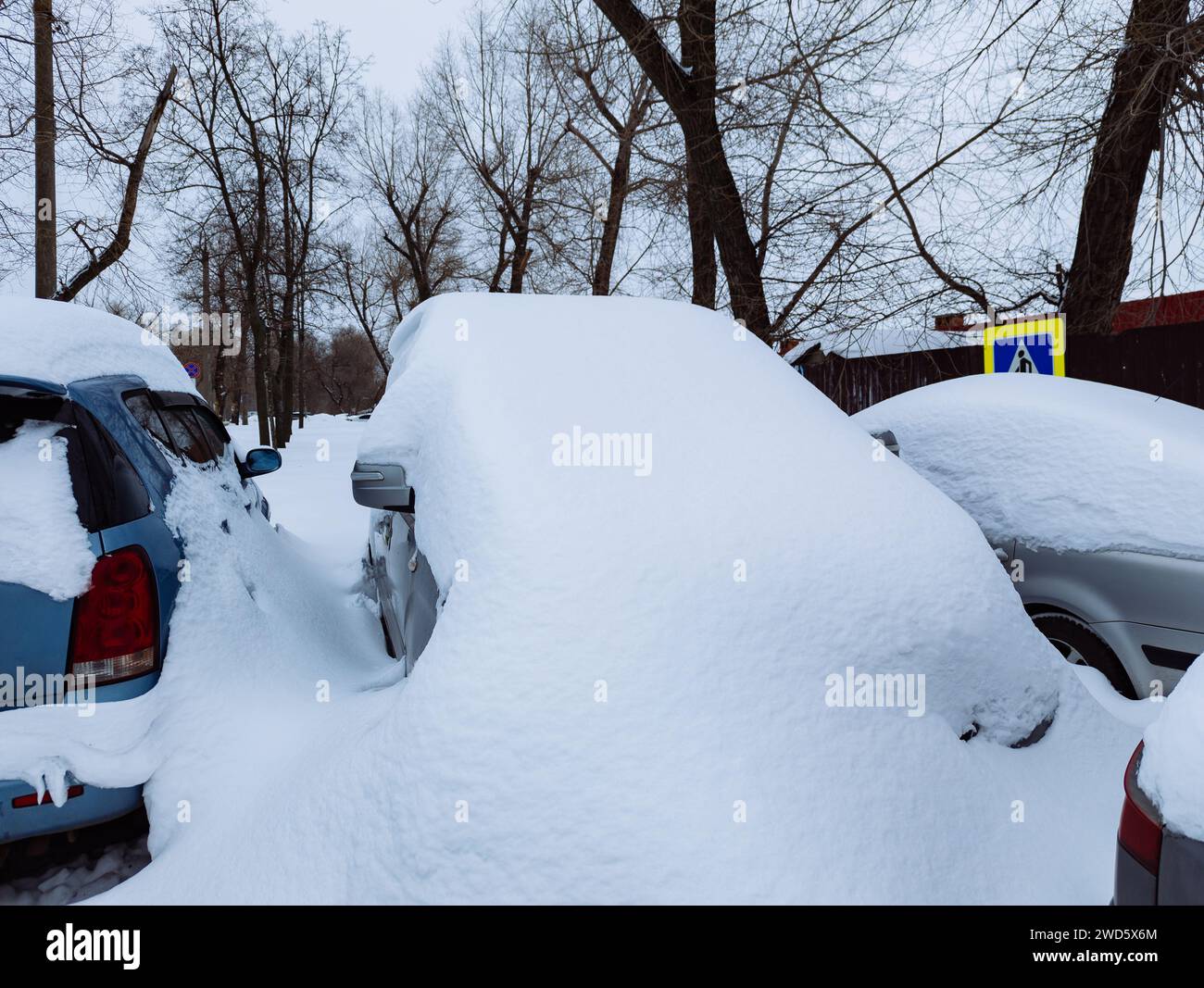 Car under snow after blizzard and snowfall Stock Photo - Alamy