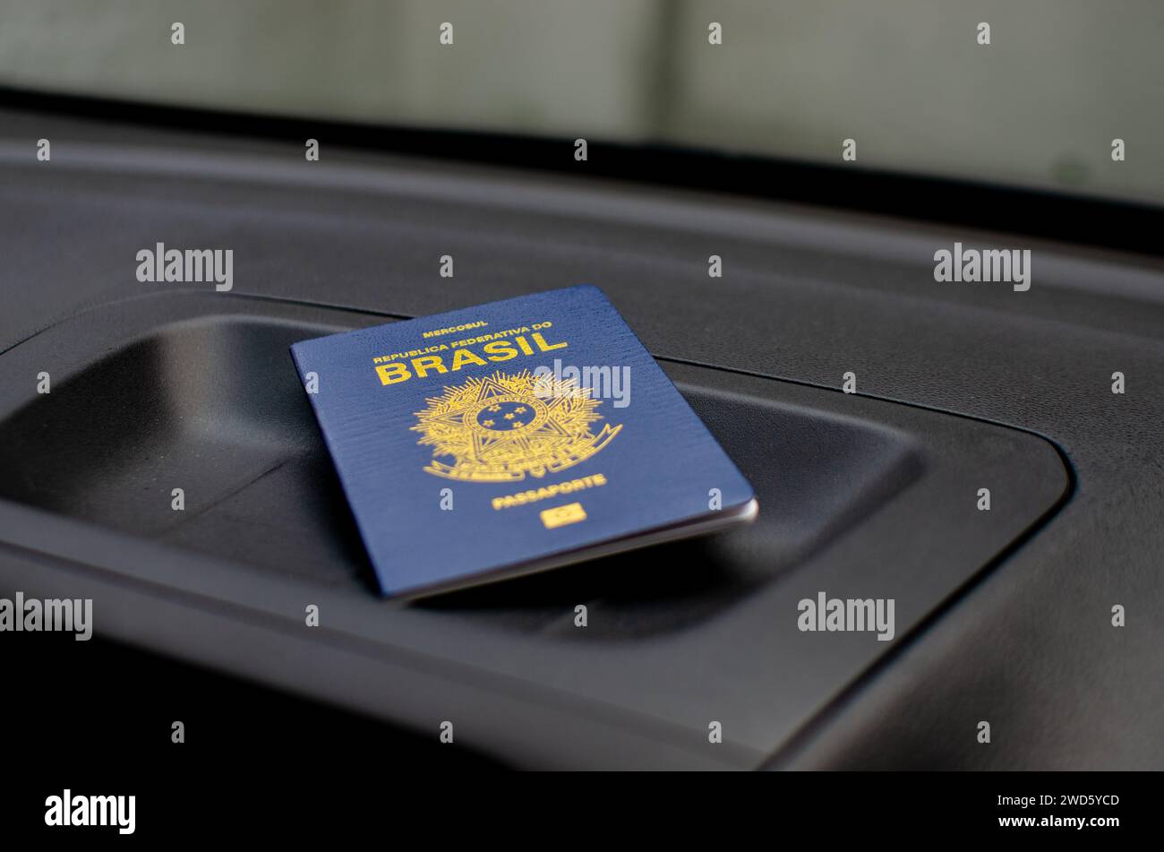 With its blue cover and golden letters, this close-up of the Brazilian ...