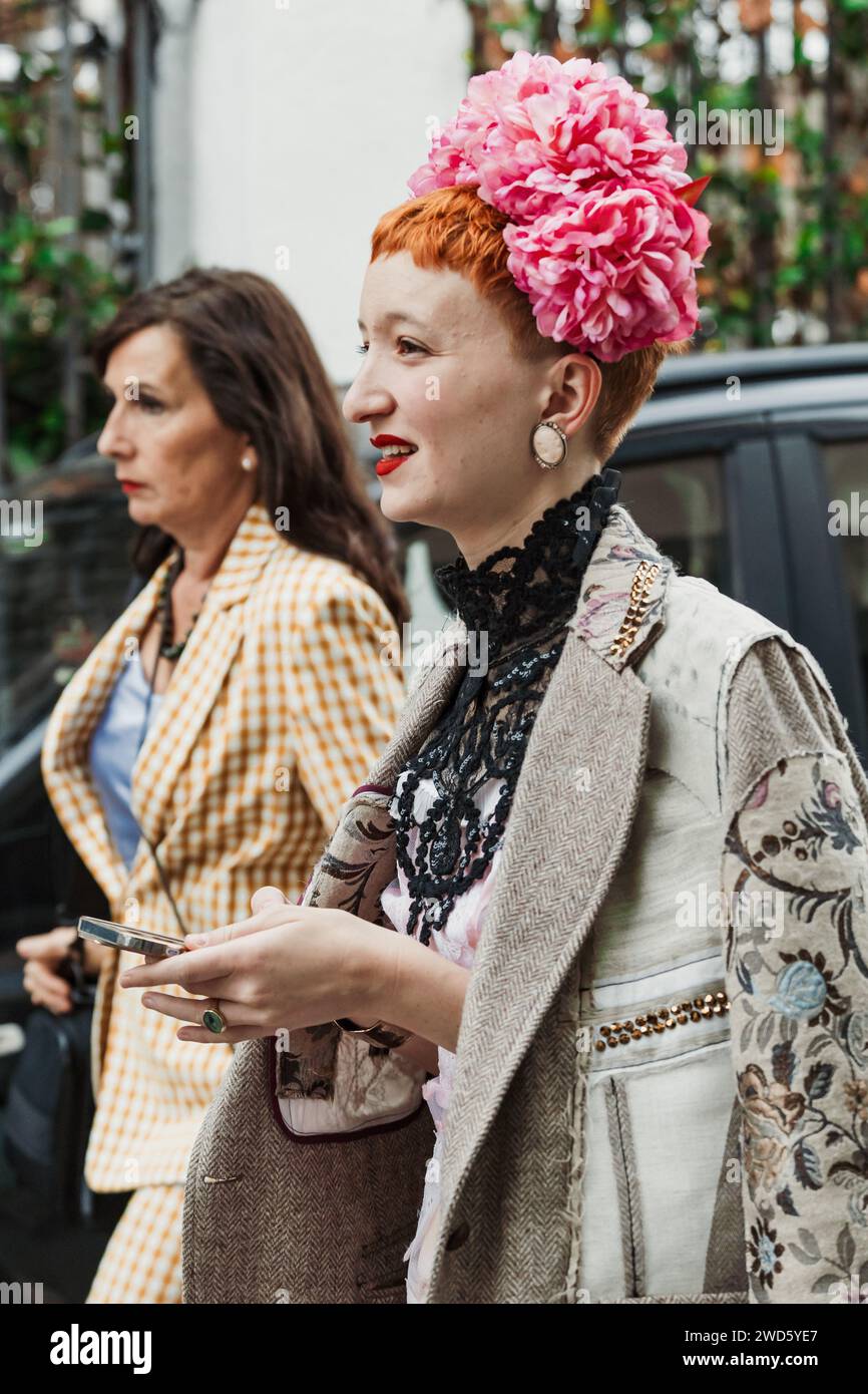 Judith Bradl wears Antonio Marras jacket and dress, outside Antonio ...
