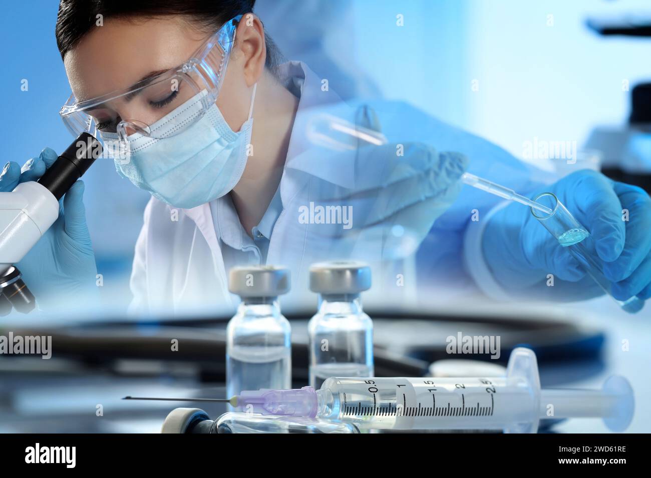 Testing, analysis and experiment. Laboratory employees working ...