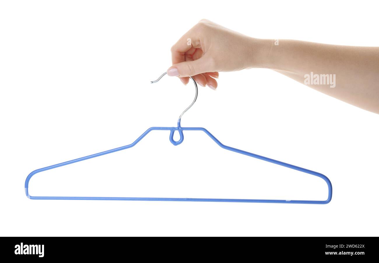 Woman holding hanger on white background, closeup Stock Photo - Alamy
