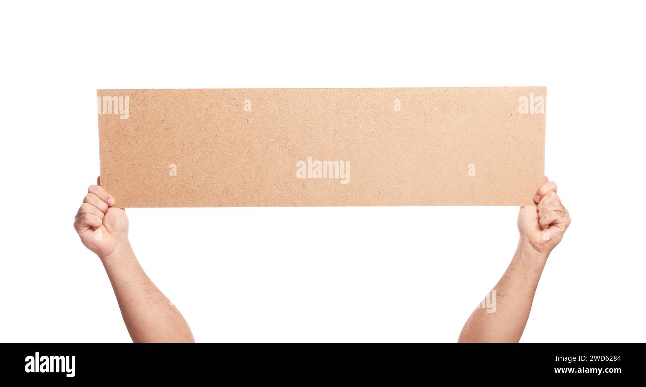 Man holding blank cardboard banner on white background, closeup. Space ...