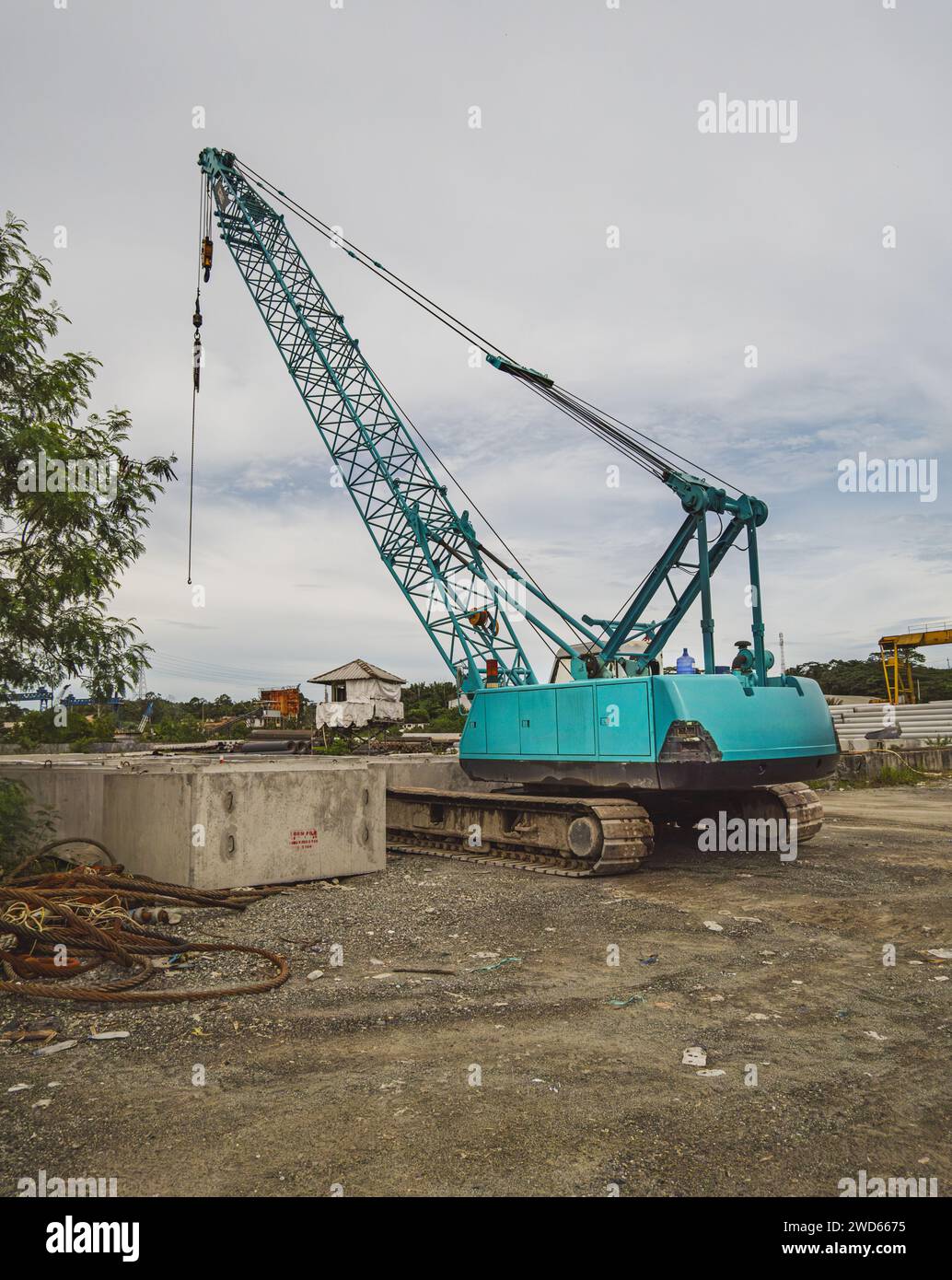 It is a large, lattice-boom crane that is typically used for heavy ...