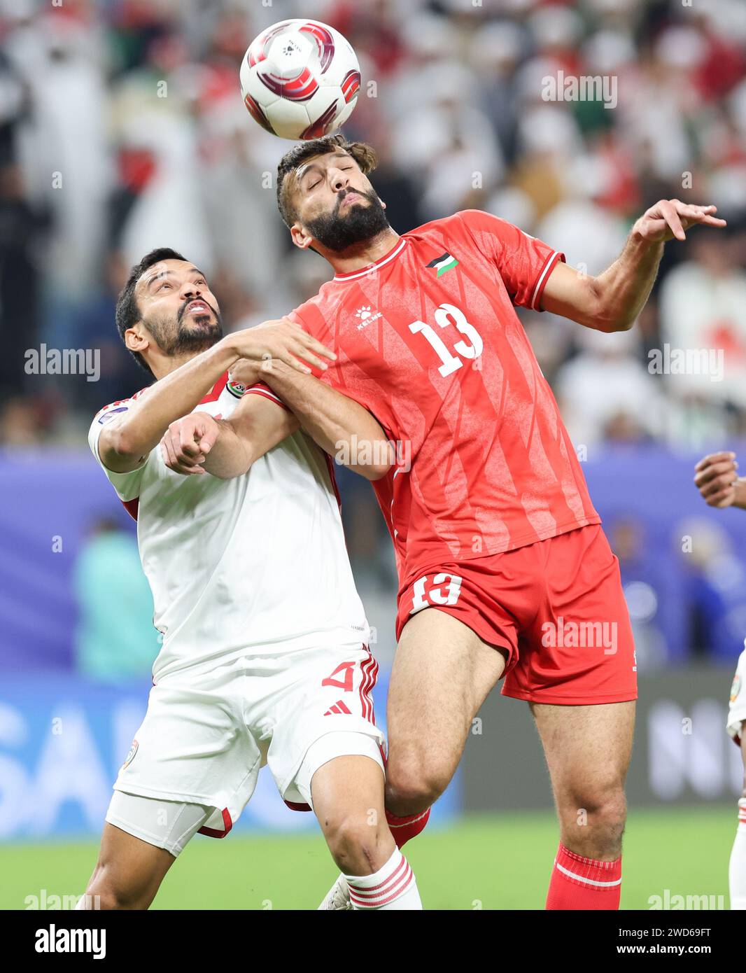 Doha, Qatar. 18th Jan, 2024. Shihab Qumbor (R) of Palestine vies with ...