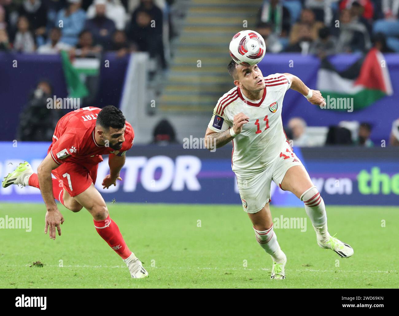 Doha, Qatar. 18th Jan, 2024. Caio Canedo (R) of United Arab Emirates ...