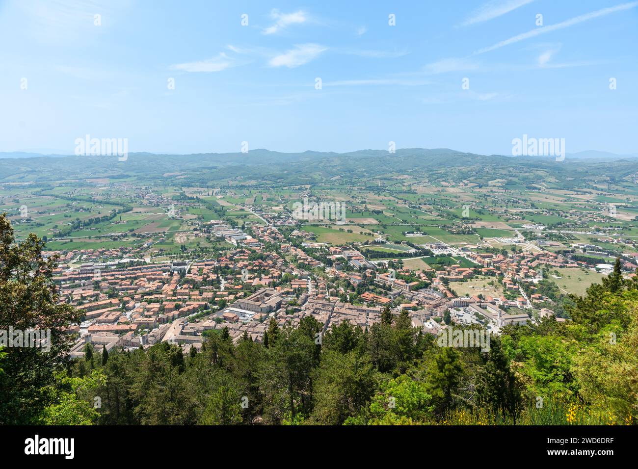 View from Mt. Ingino over medieval walled town of Gubbio and expansive ...