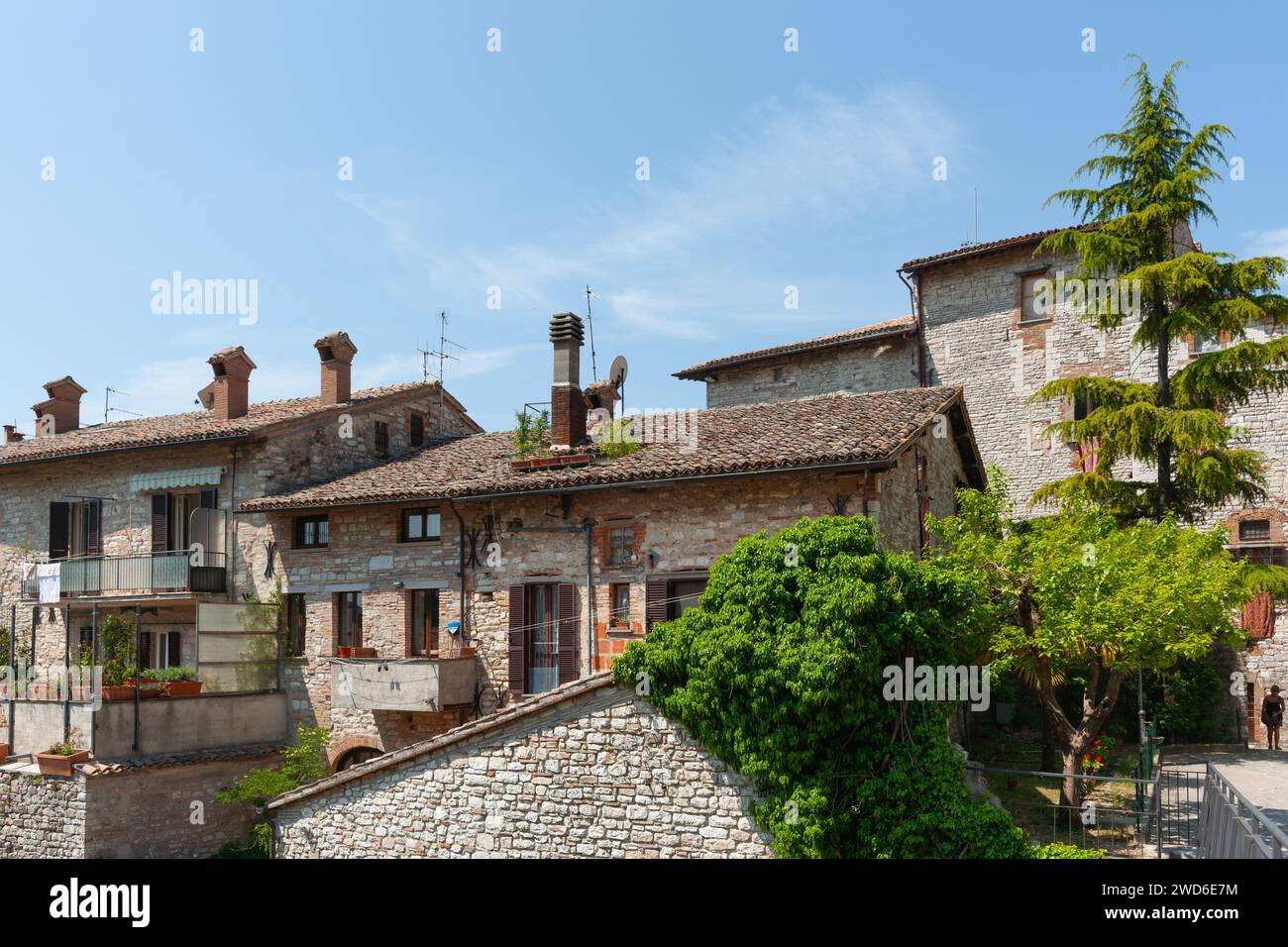 Rooftops showing closeness of homes and landscape of old Italian walled ...