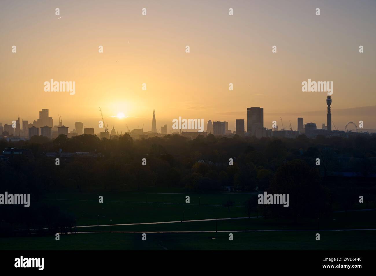 The sun rising over London, viewed from Primrose Hill Stock Photo - Alamy
