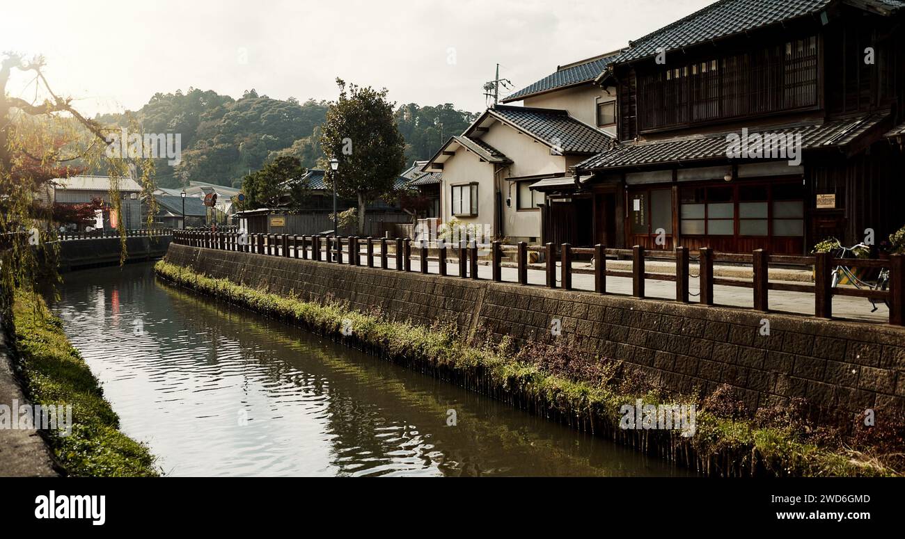 Houses, building and canal with trees in Japan of architecture ...