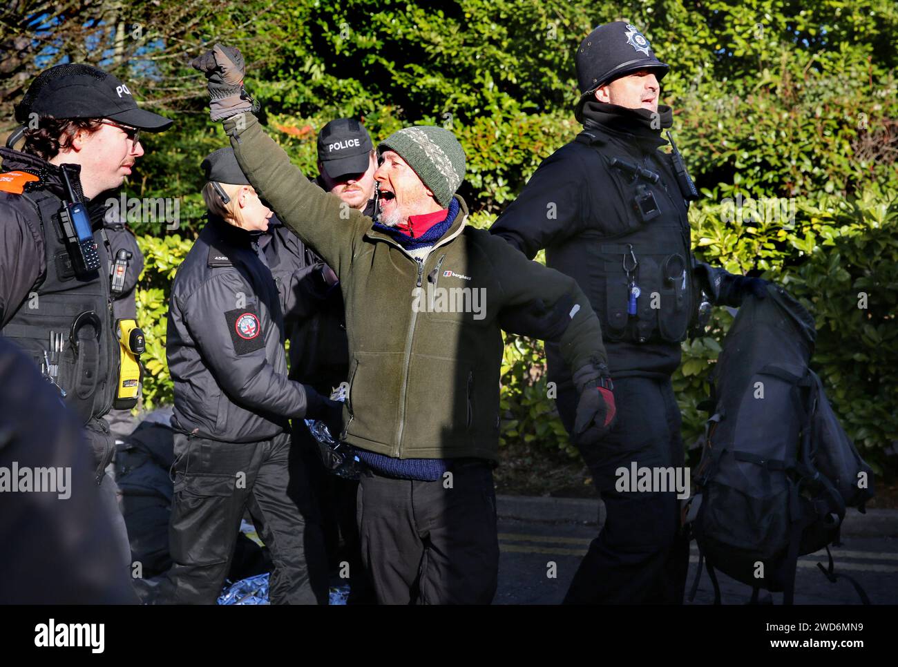 Bristol, UK. 18th Jan, 2024. An activist salutes supporters as he is ...