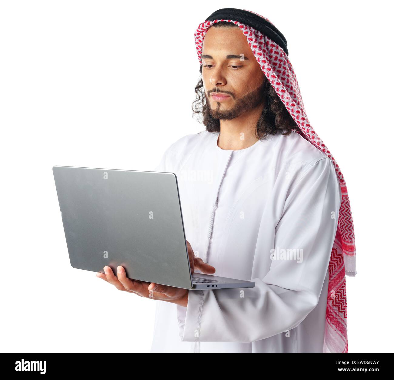 Arab man wearing traditional clothes using laptop isolated on white ...