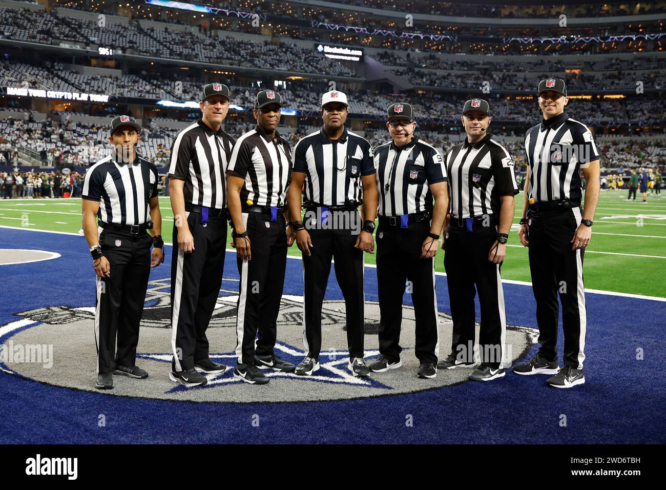 Left to right, NFL officials, side judge, Dominique Pender (114), back ...