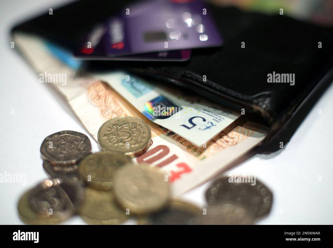 File photo dated 20/01/17 of coins and a five pound and ten pound ...