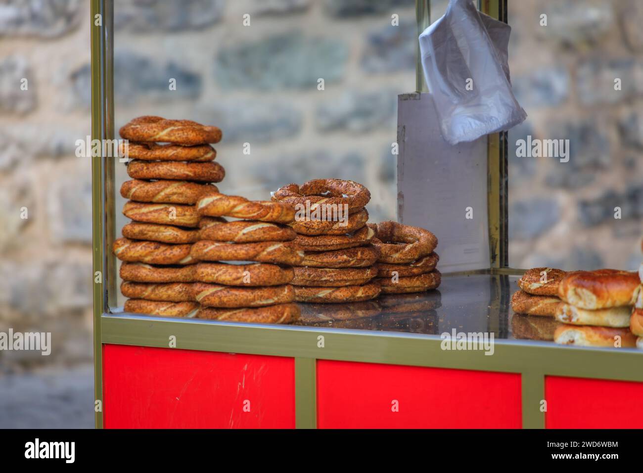 A red mobile simit cart with Turkish bagels, traditional Turkish street ...