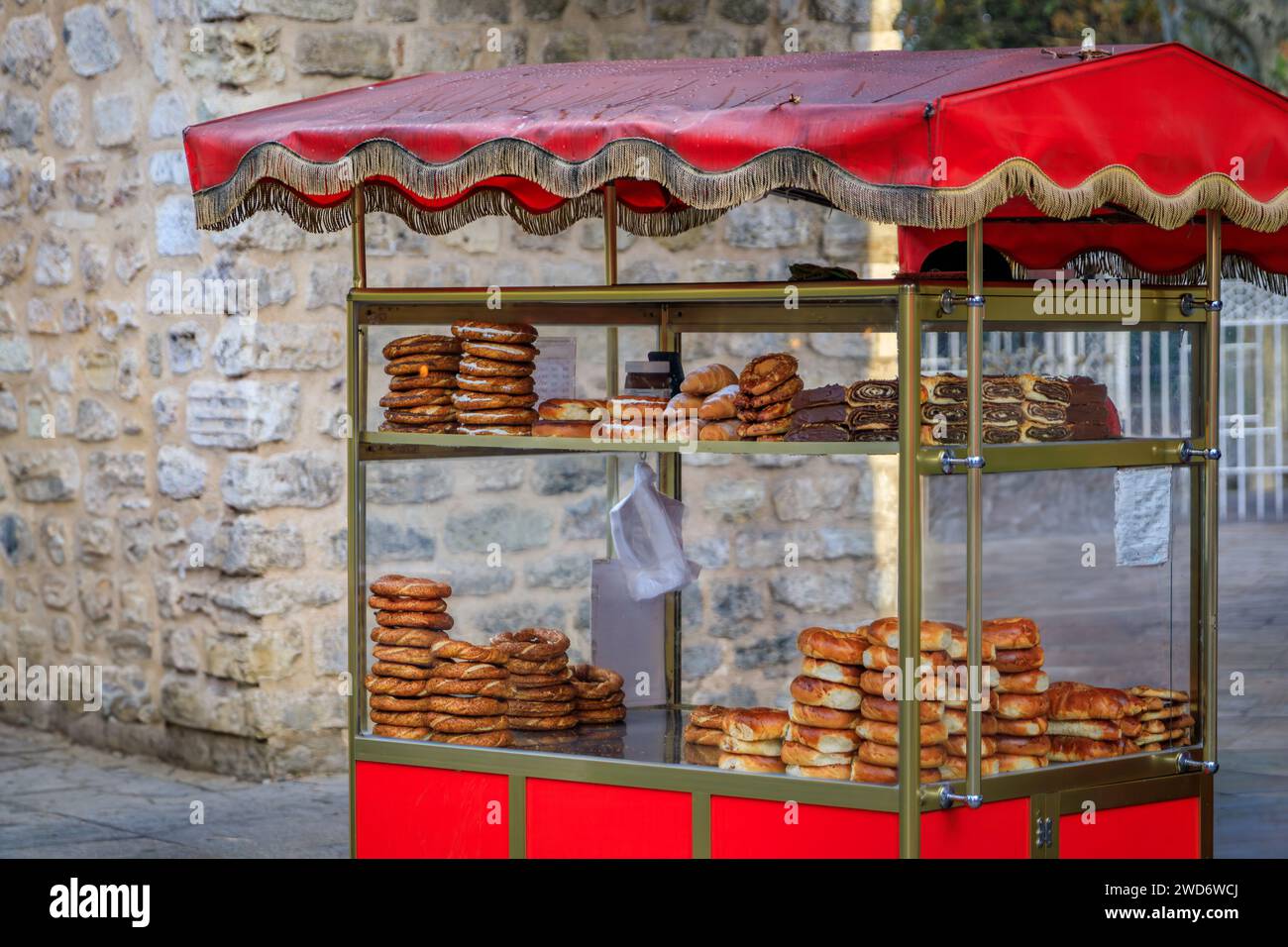 A red mobile simit cart with Turkish bagels, traditional Turkish street ...