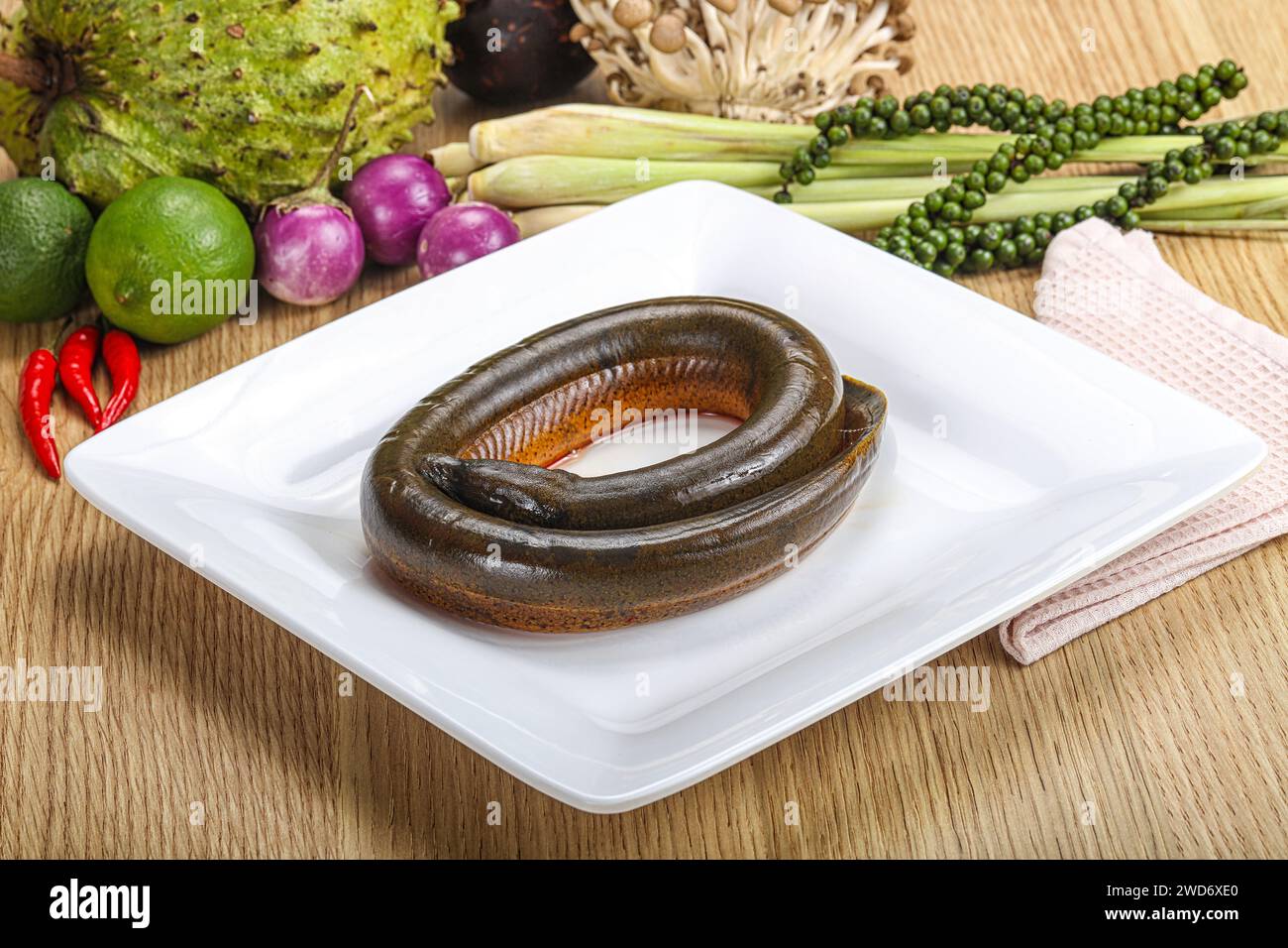Fresh raw uncooked eel for grill in the bowl Stock Photo - Alamy