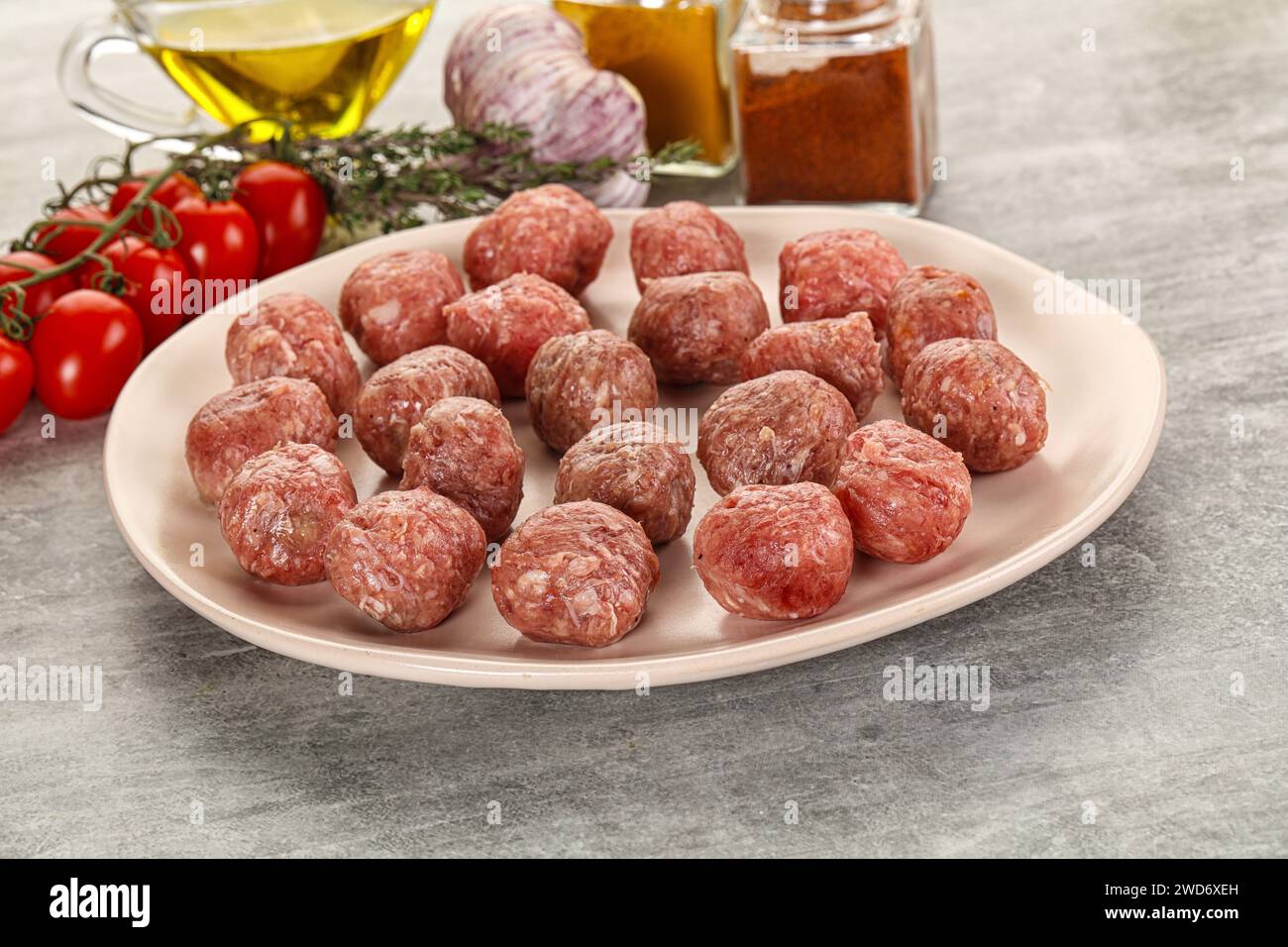 Uncooked raw beef meatball minced meat Stock Photo - Alamy