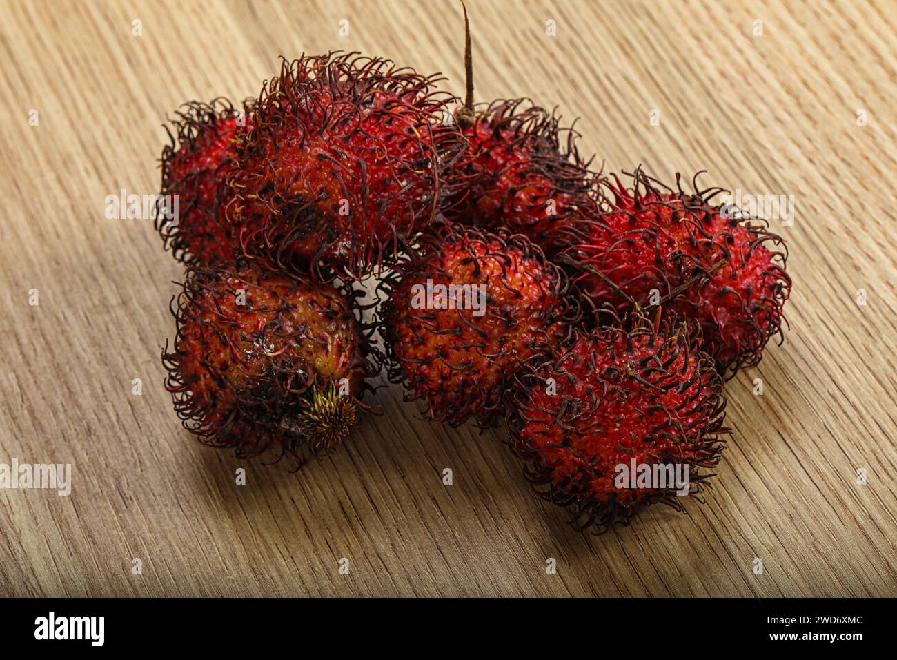Sweet ripe juicy hairy Rambutan fruit Stock Photo - Alamy
