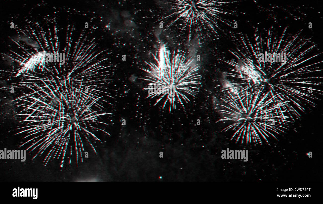 Festive bright colored fireworks on background a dark night sky ...