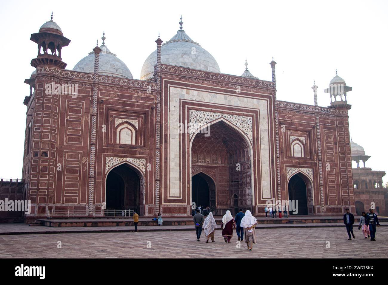 The Jawab, a red sandstone building is a mirror image of the Mosque ...