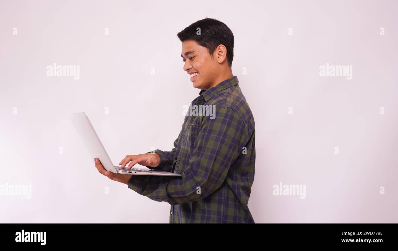 Asian student typing laptop hi-res stock photography and images - Alamy