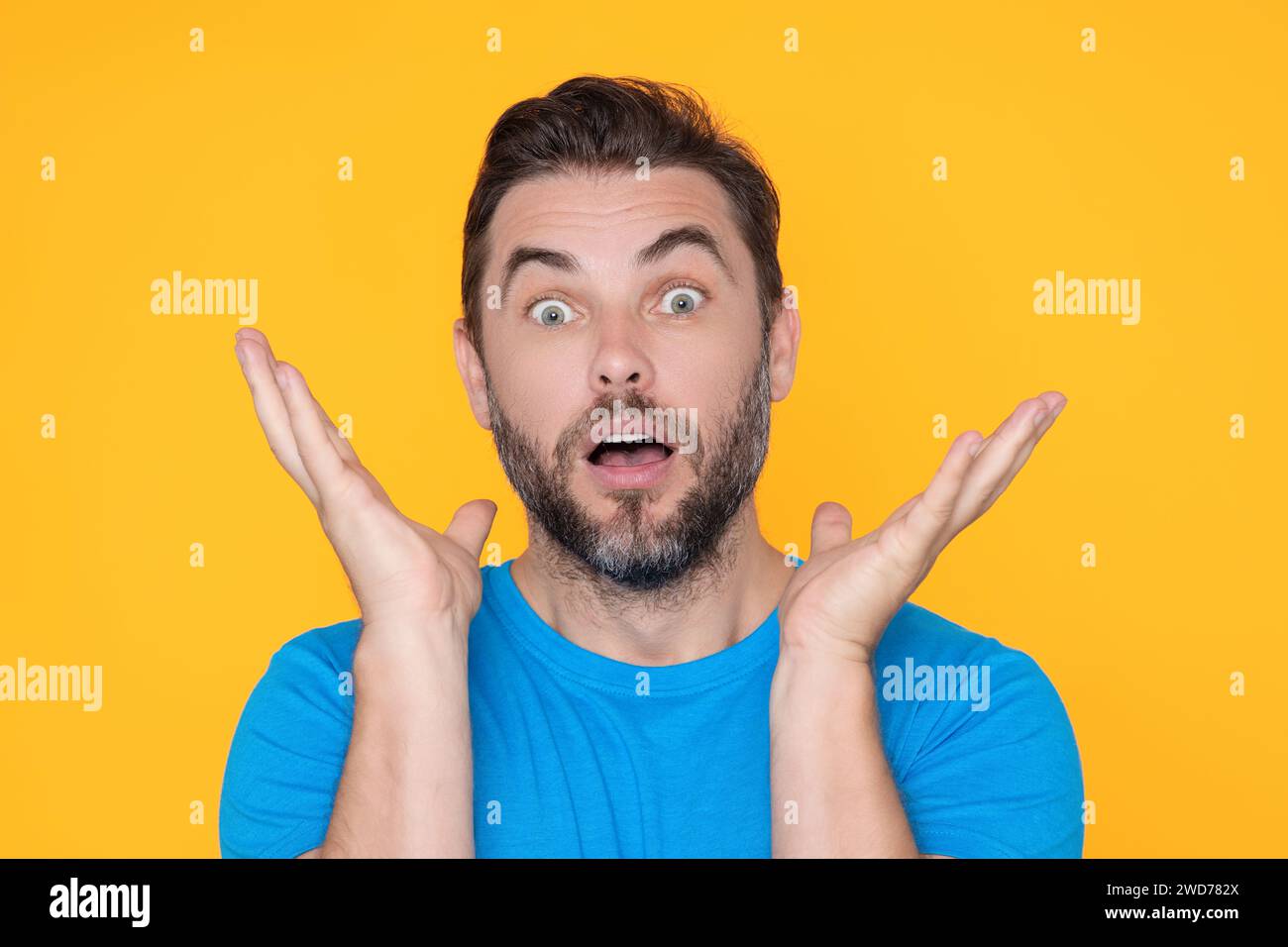 Emotional scared man looks with frightened expression, nervously ...