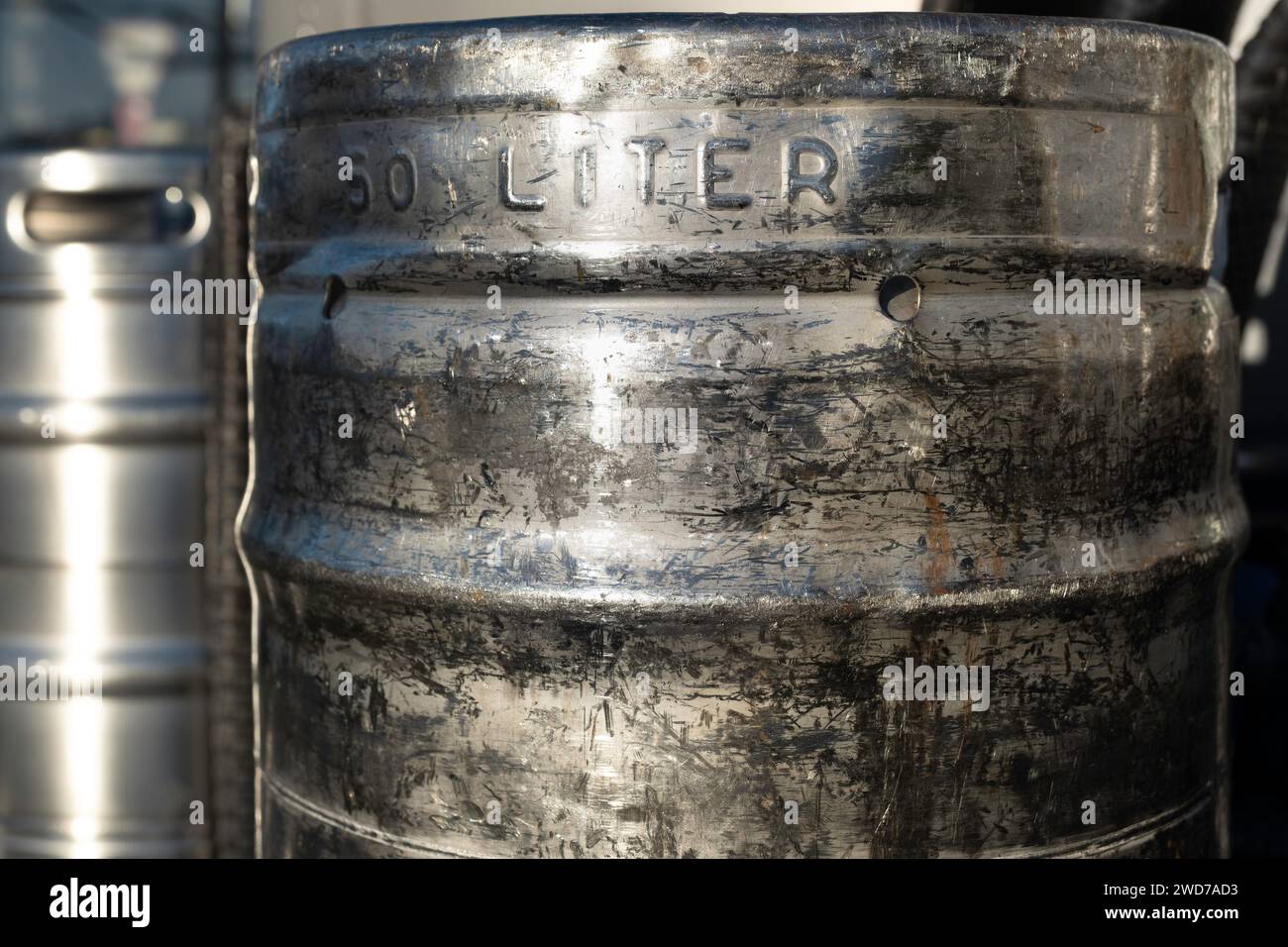 Large damaged metal beer barrels with the text '50 liter' Stock Photo ...