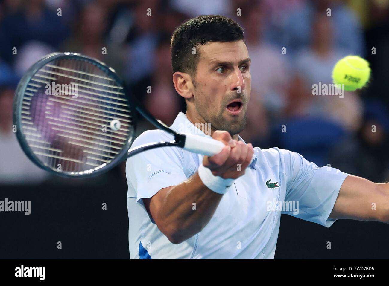 Novak Djokovic of Serbia plays a forehand return to Tomas Martin Etcheverry of Argentina during ...