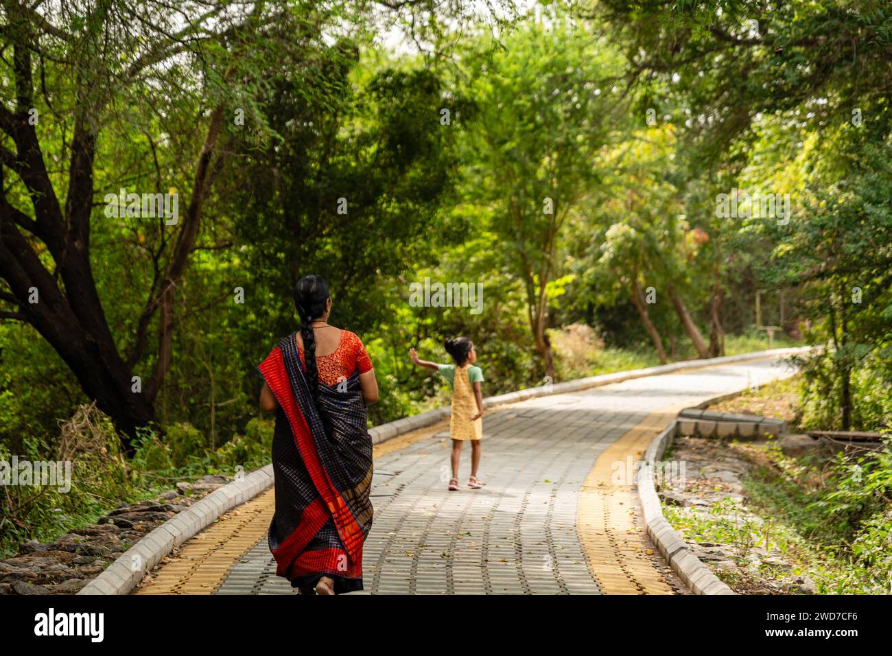 A heartwarming scene of a young girl and her grandmother enjoying a ...