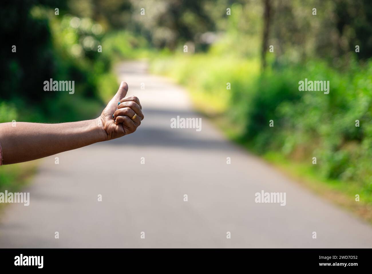 Person asking for a lift hi-res stock photography and images - Alamy