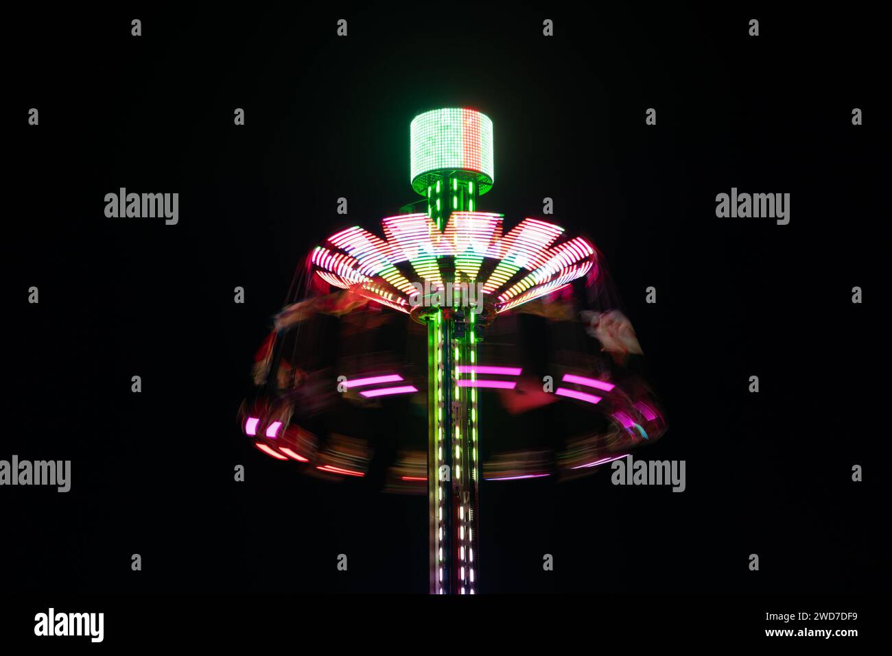 carousel roundabout, swinging turning around Stock Photo - Alamy