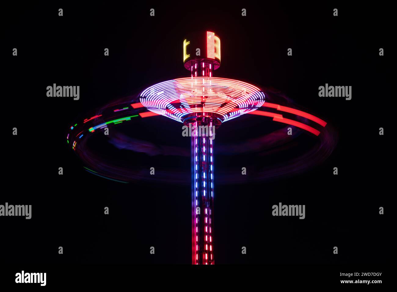 carousel roundabout, swinging turning around Stock Photo - Alamy
