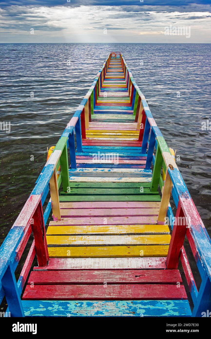 Colorful footbridge over the sea with horizon Stock Photo - Alamy