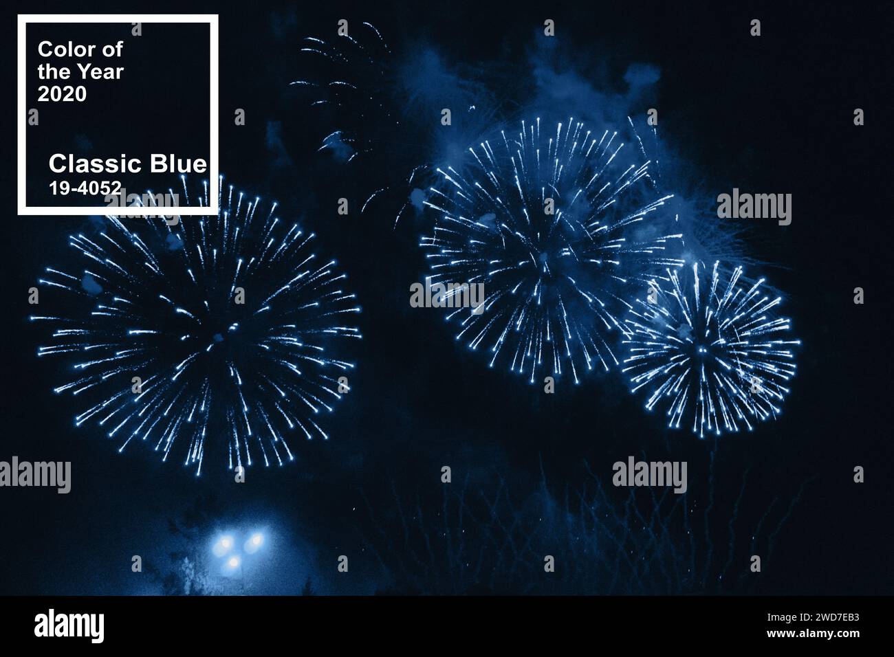 Classic Blue color of the Year 2020. Festive fireworks in the night sky ...